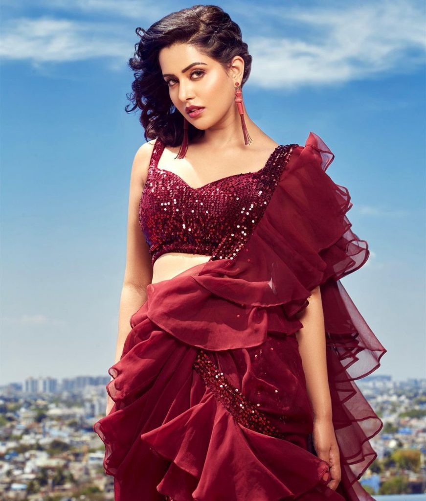 charismatic-raiza-wilson-gleaming-look-in-maroon-ruffled-saree-with ...