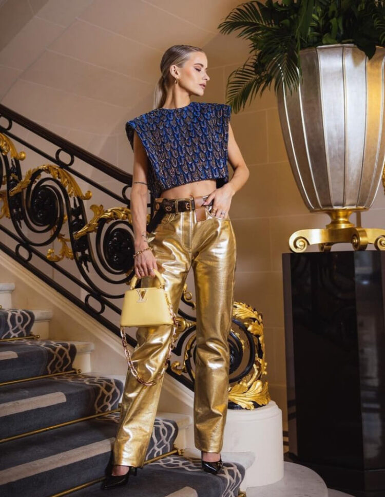 Victoria Magrath In a Blue Puffed Crop Top With Golden Pants - K4 Fashion